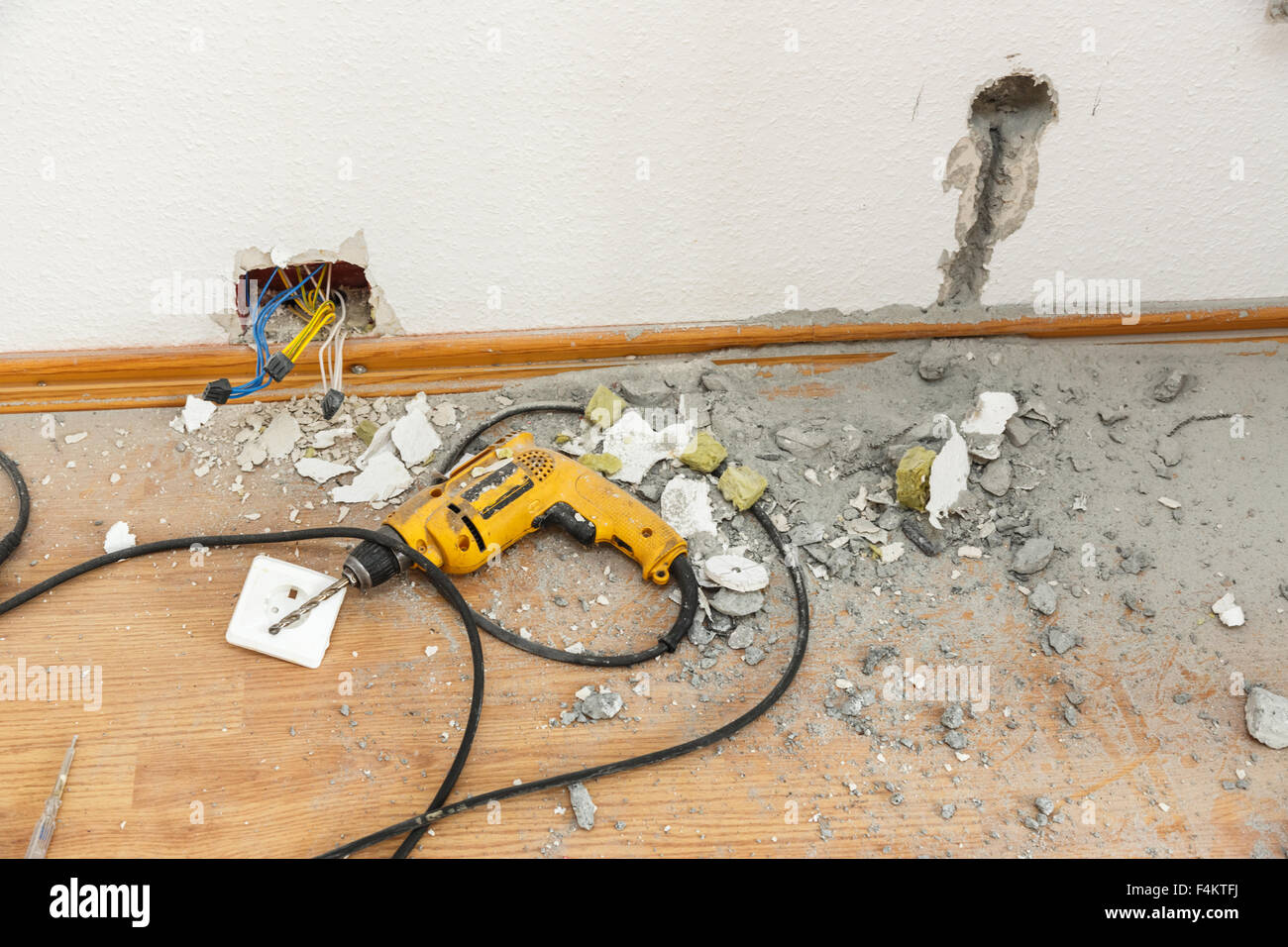 Place of electric socket repair process with drill Stock Photo - Alamy
