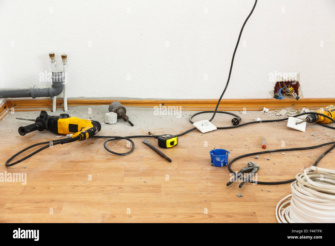 Place of electric socket repair process with drill Stock Photo - Alamy