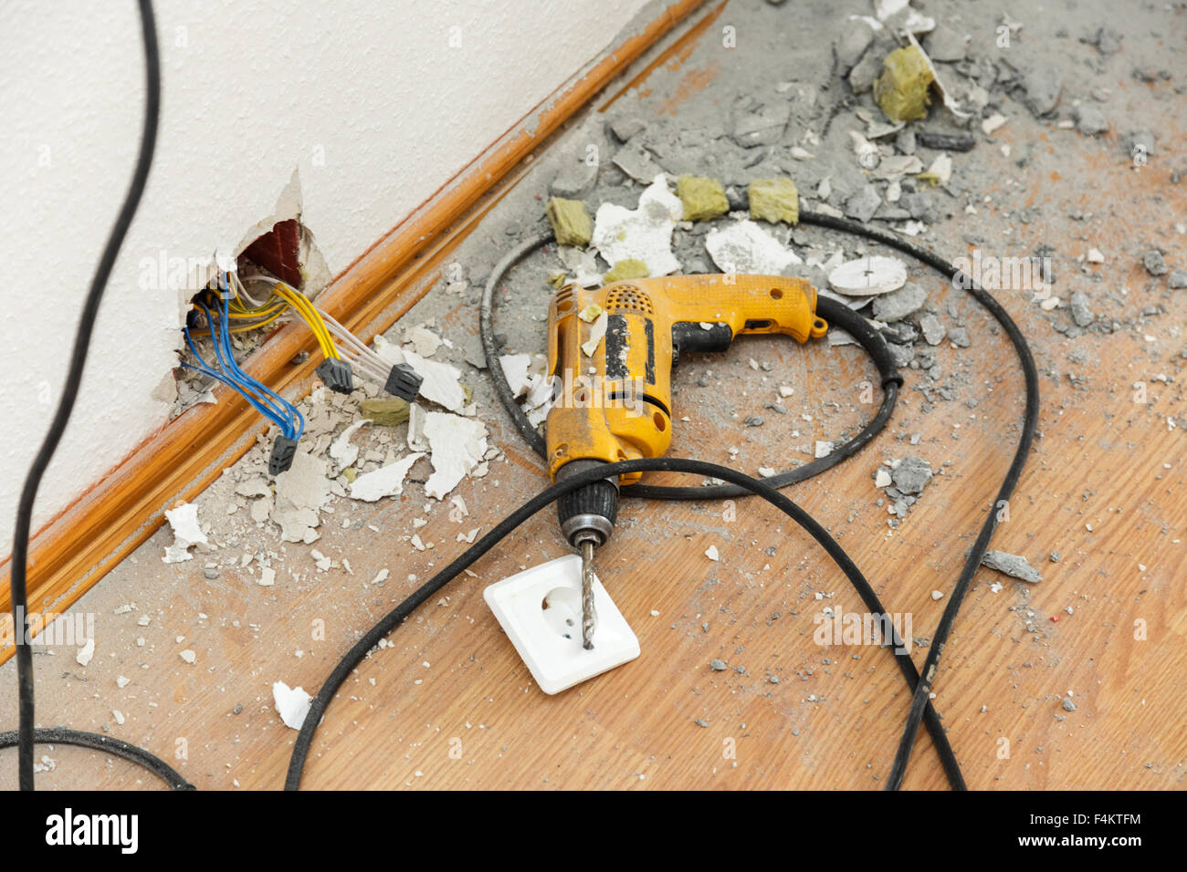 Place of electric socket repair process with drill Stock Photo - Alamy