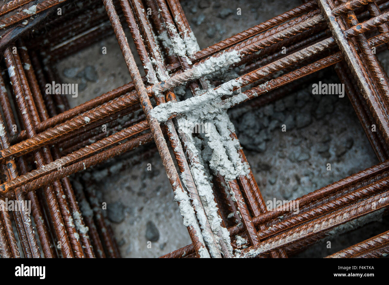 Splashes of concrete on pile of rebar Stock Photo - Alamy