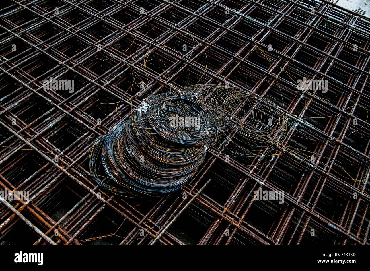 Coil of wire on construction rebar Stock Photo - Alamy