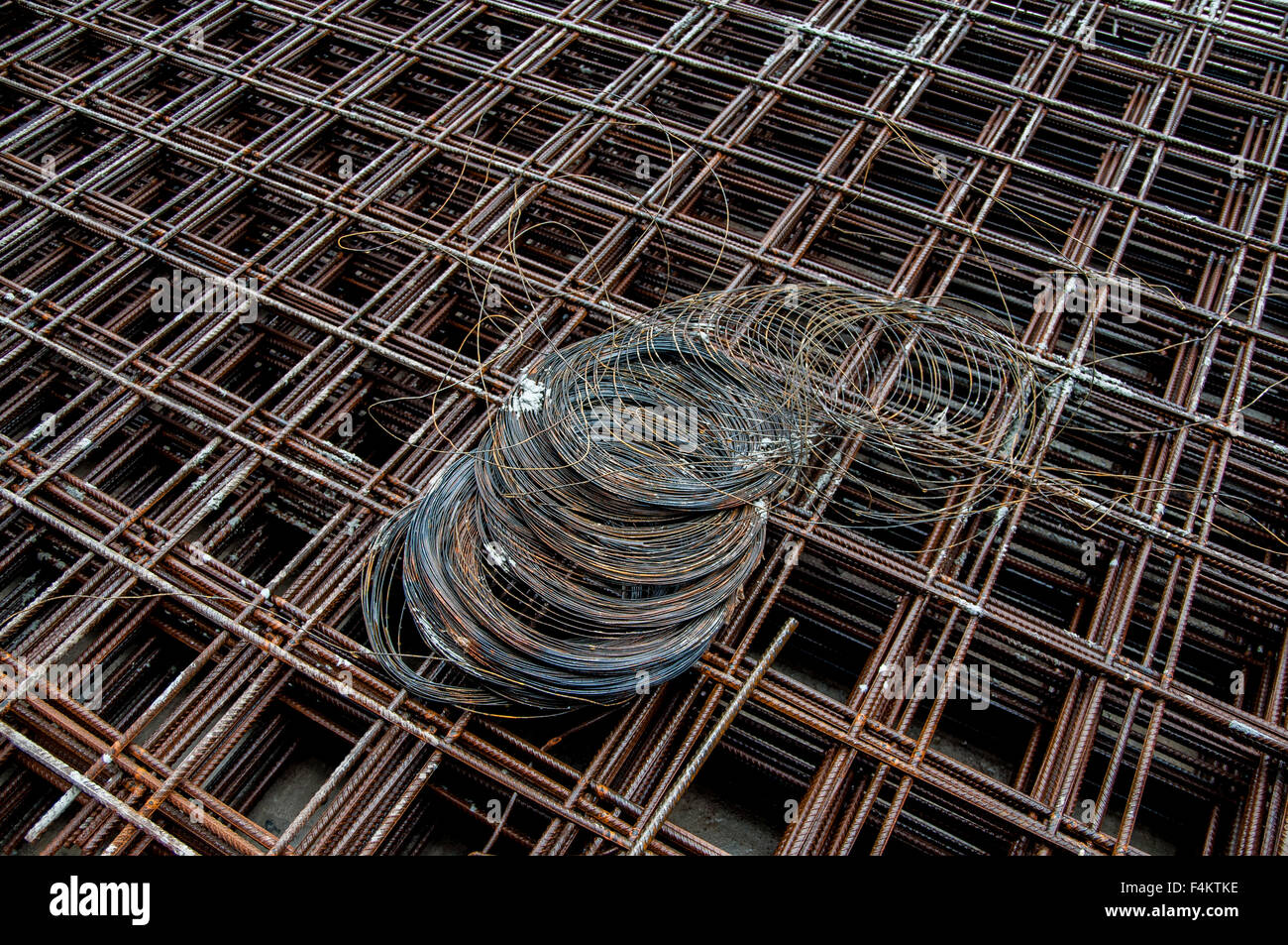 Coil of wire on construction rebar Stock Photo - Alamy