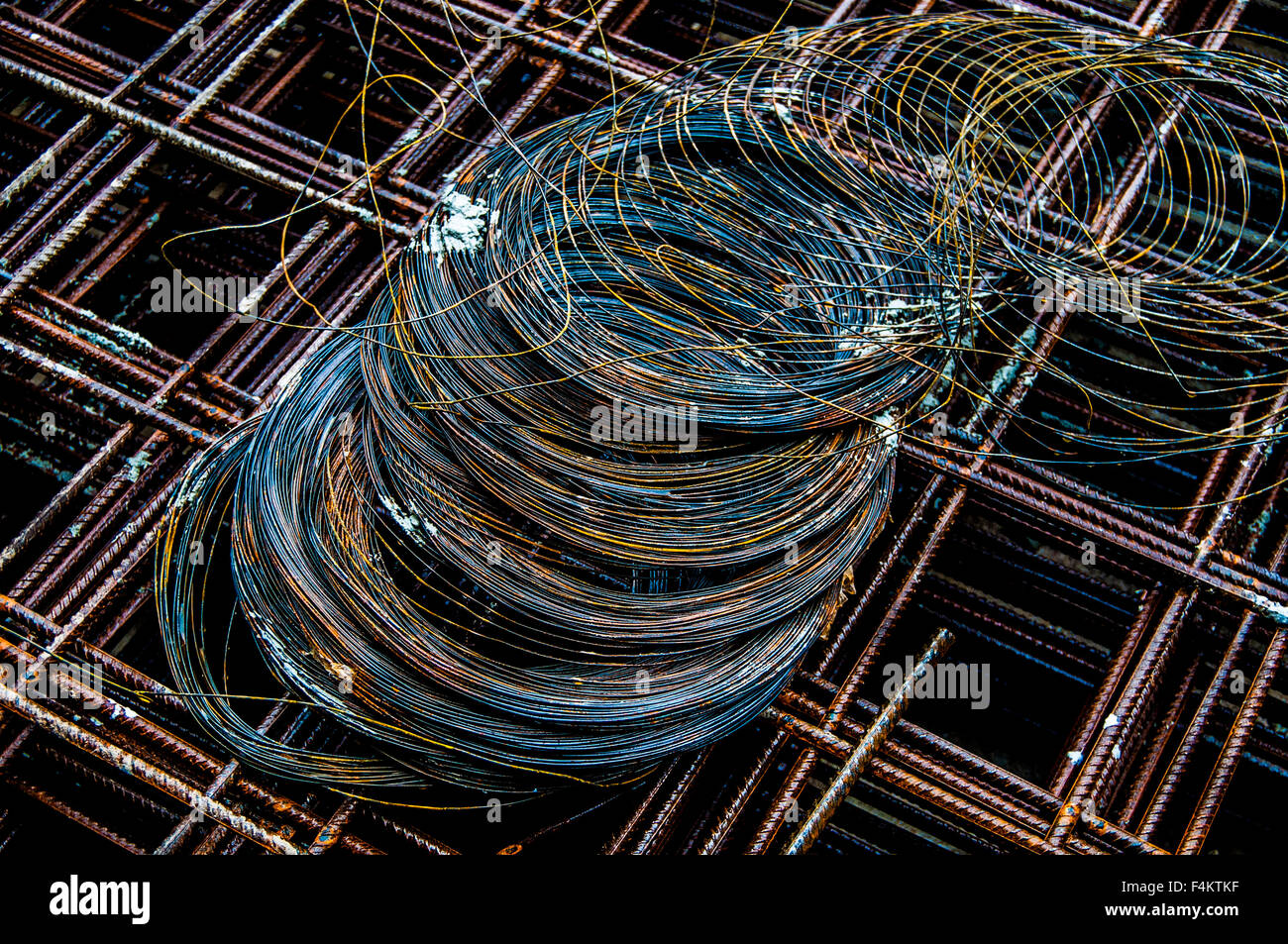 Coil of wire on construction rebar Stock Photo - Alamy