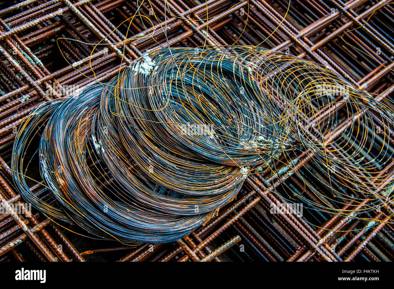 Coil of wire on construction rebar Stock Photo - Alamy