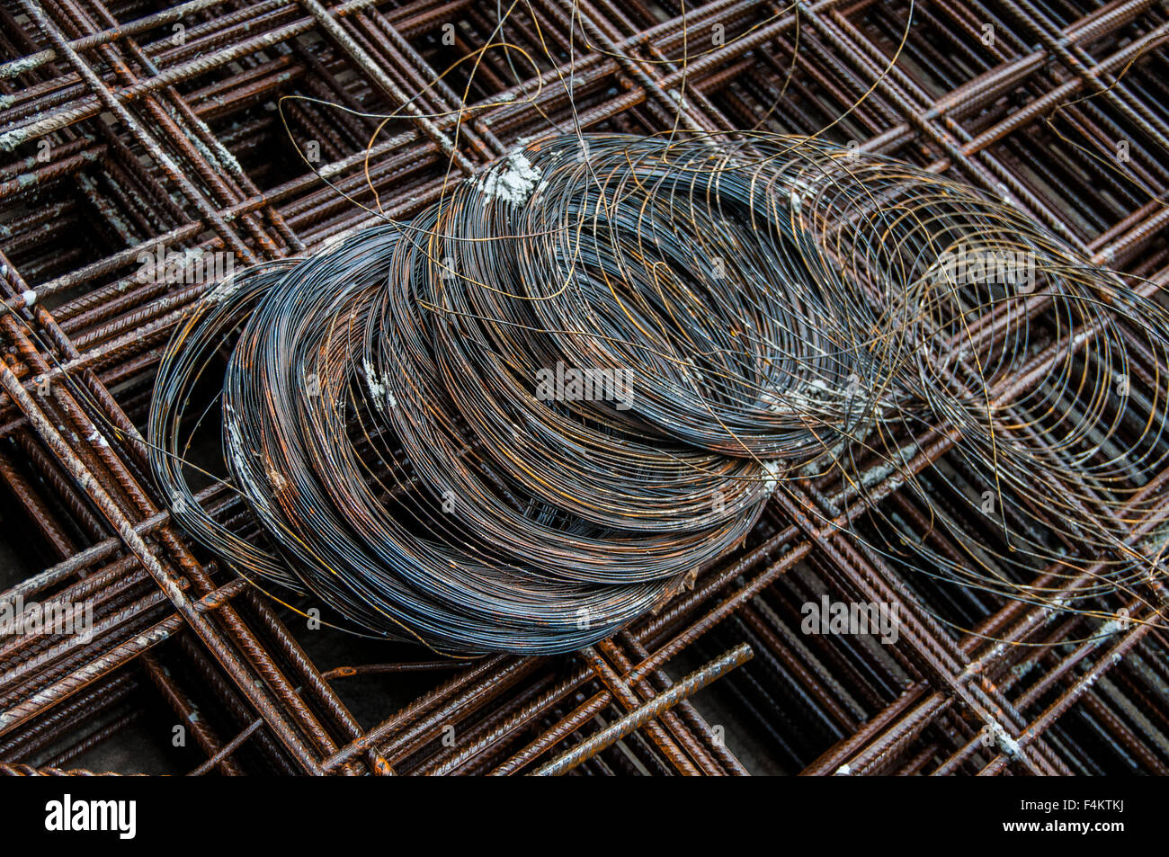 Coil of wire on construction rebar Stock Photo - Alamy