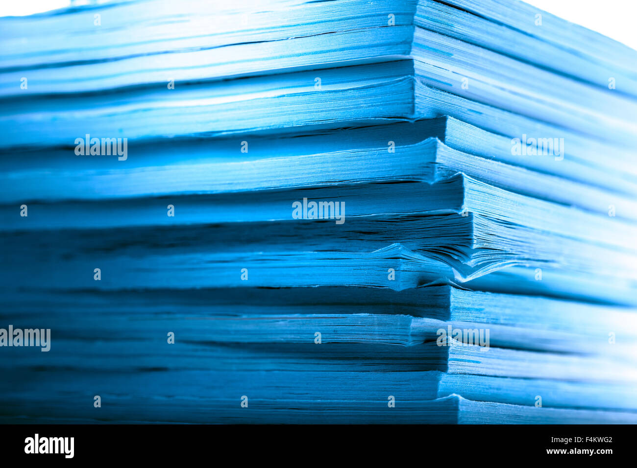 Stack of old magazines as background in toning Stock Photo - Alamy
