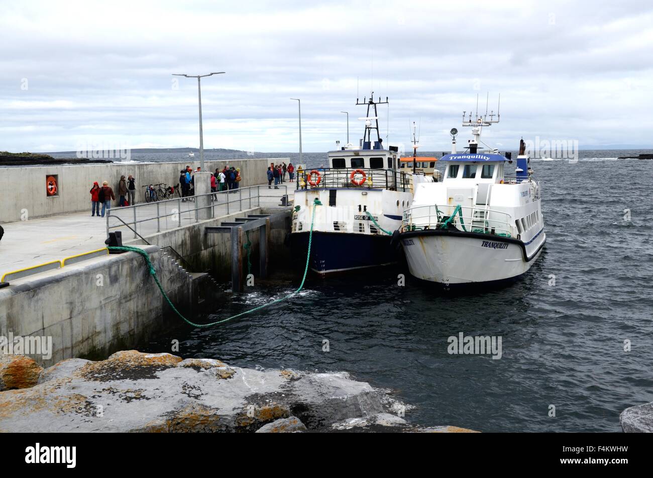 Ferry Boats at the pier Inis Oirr Inisheer Aran islands Ireland Stock ...