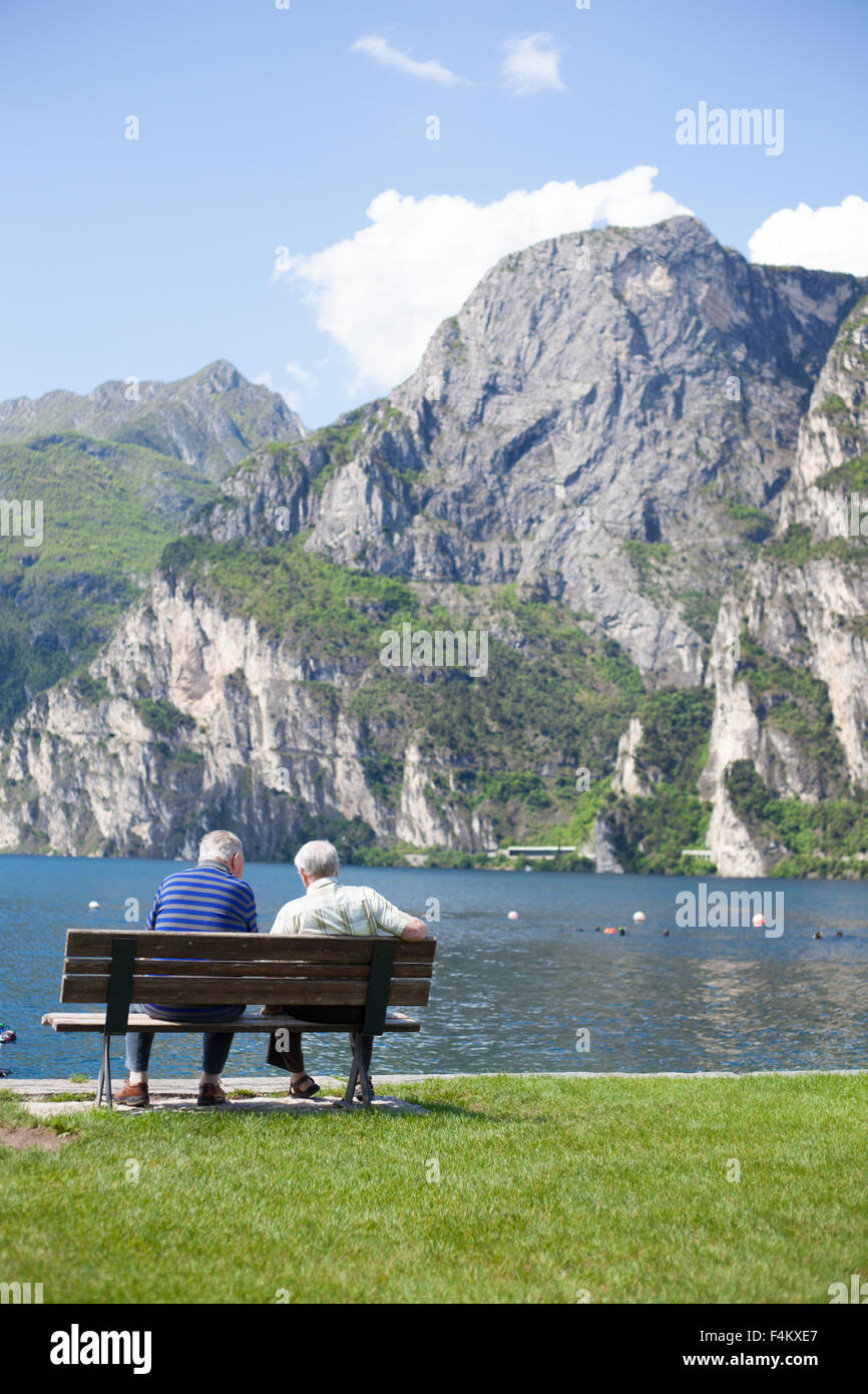 Two seniors resting on bench Stock Photo - Alamy