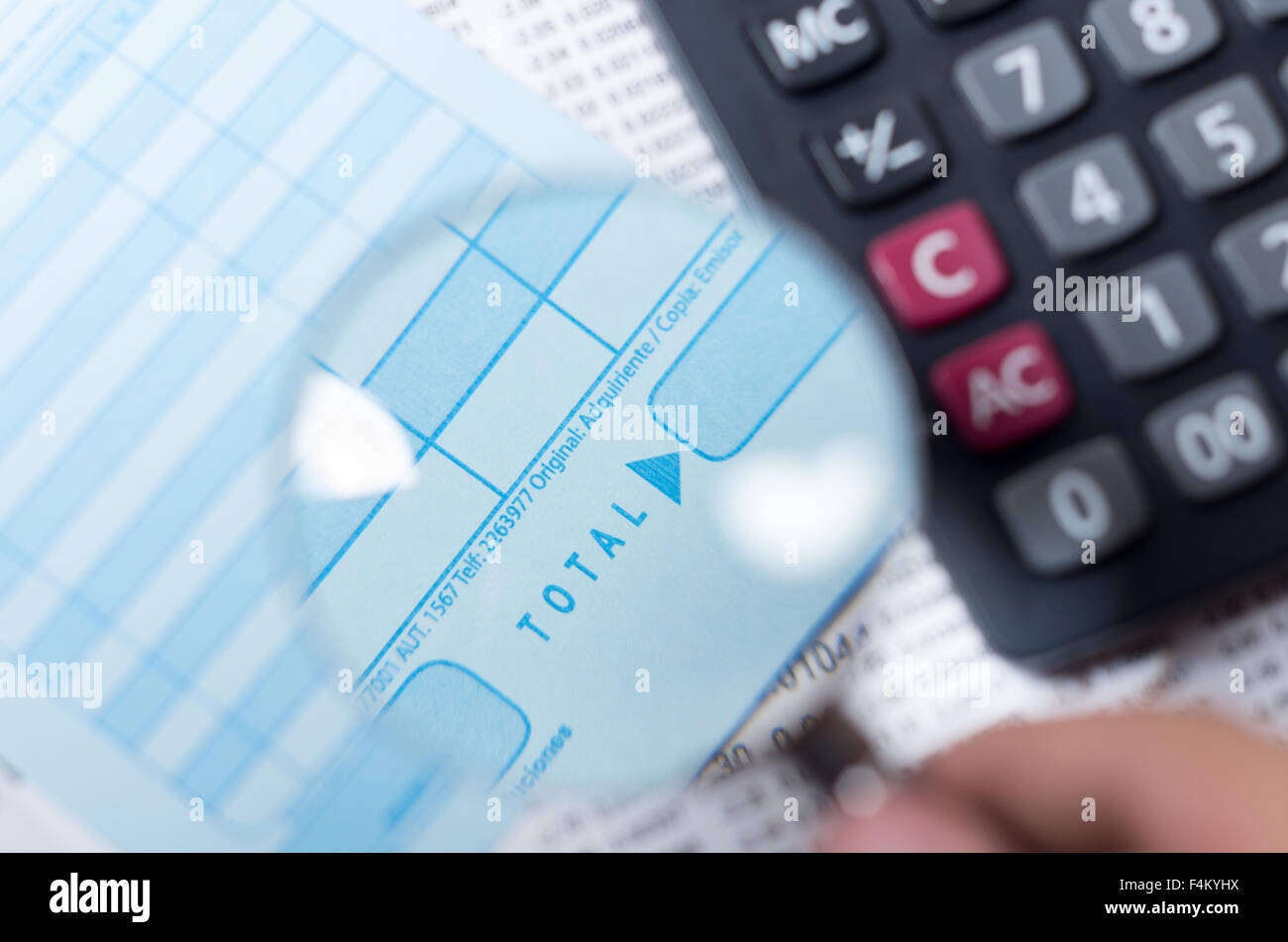 Magnifying glass over financial graph hi-res stock photography and ...