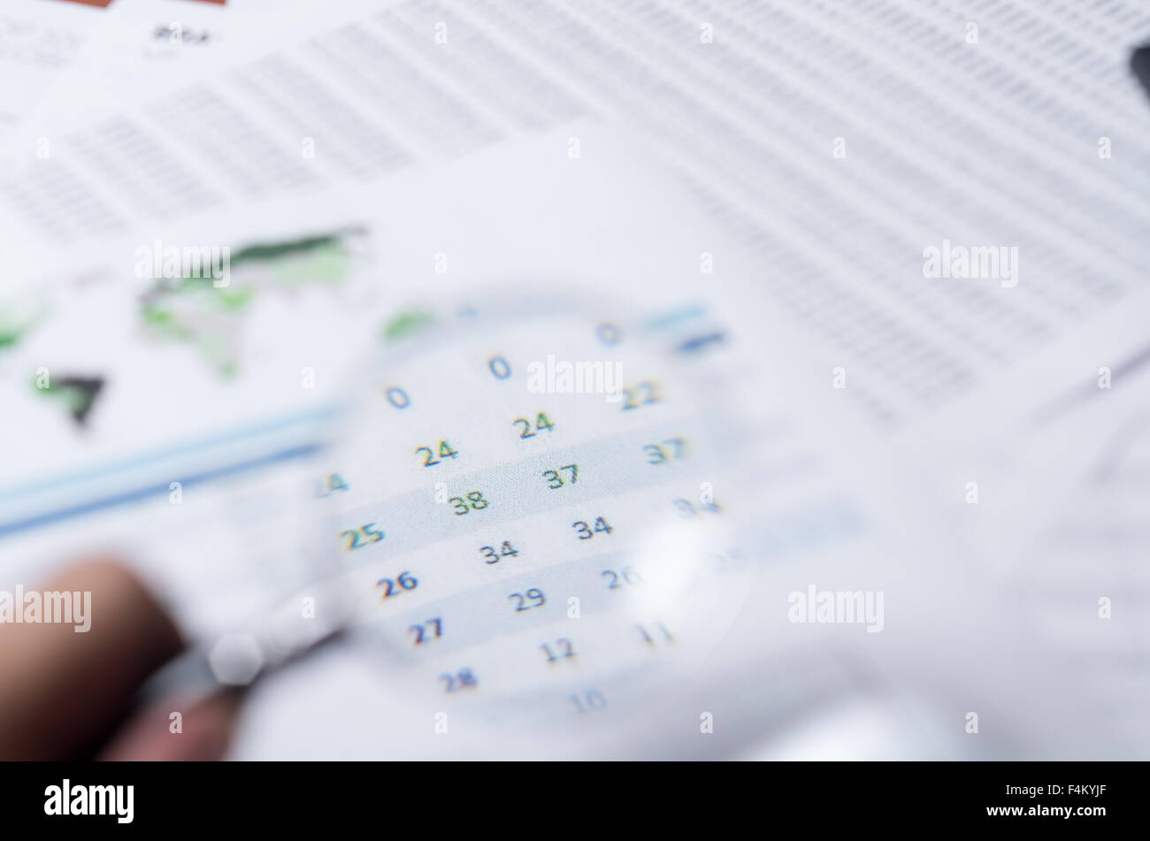 Magnifying glass over numbers hi-res stock photography and images - Alamy