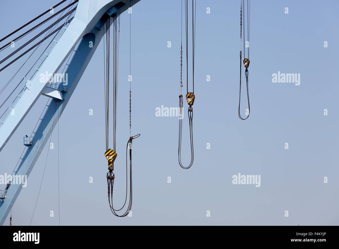 Crane boom against a clear blue sky Stock Photo - Alamy