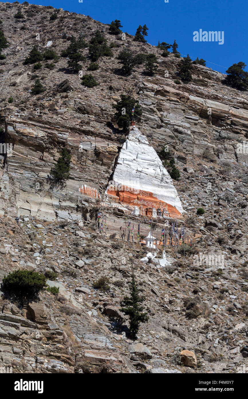 Painted rockface, Marpha, Mustang, Nepal Stock Photo - Alamy