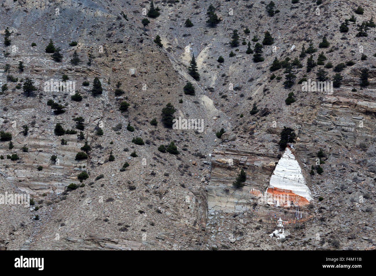 Painted rockface, Marpha, Mustang, Nepal Stock Photo - Alamy