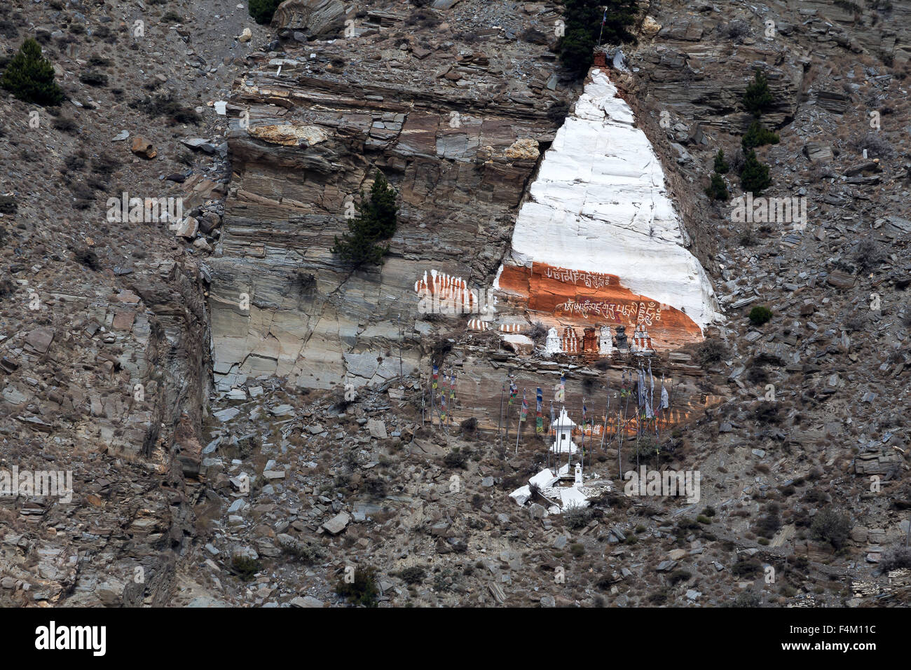 Painted rockface, Marpha, Mustang, Nepal Stock Photo - Alamy