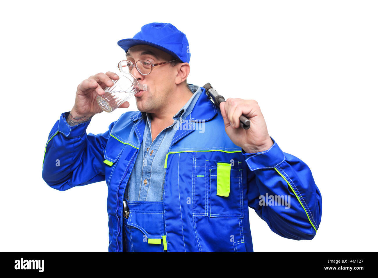 adult drunk mechanic working with glass of alcohol Stock Photo - Alamy