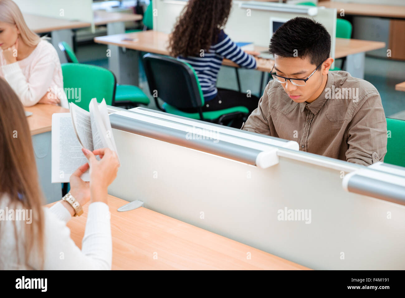 High school students reading library hi-res stock photography and ...