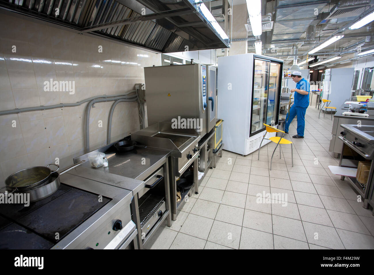 Kitchen in restaurant interior Stock Photo - Alamy