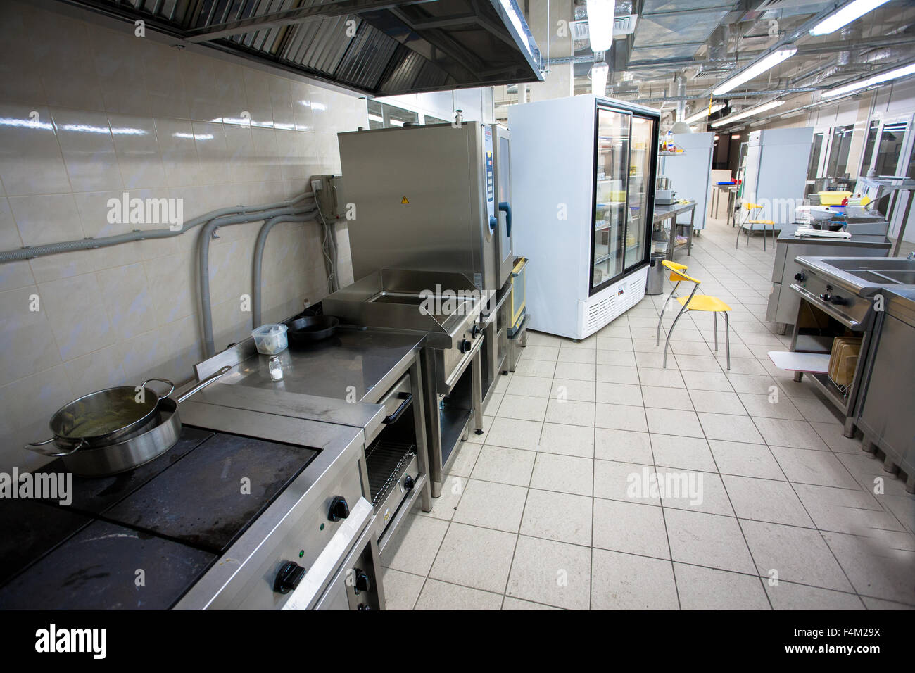 Kitchen in restaurant interior Stock Photo - Alamy