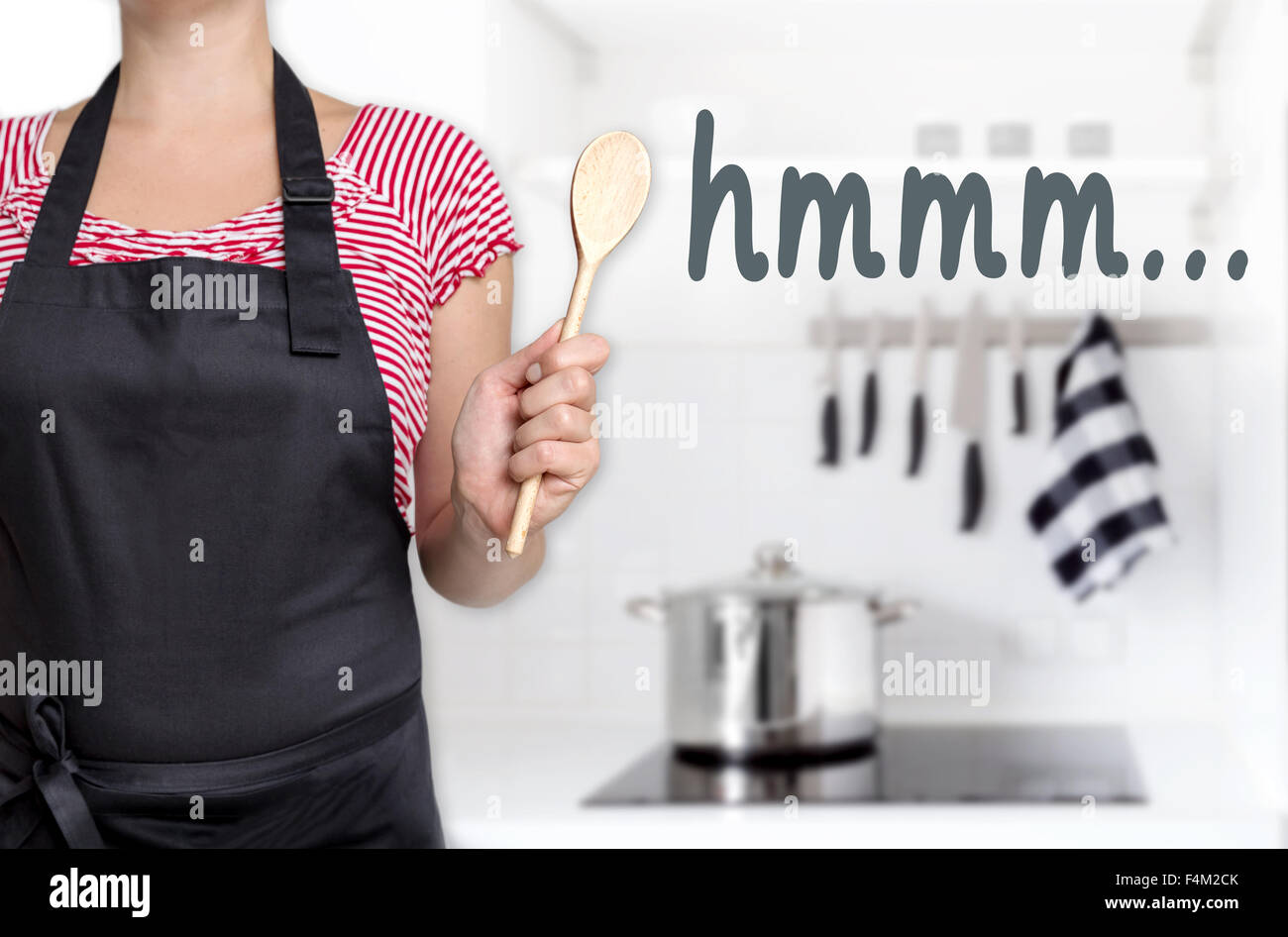 hmm cook holding wooden spoon background concept Stock Photo - Alamy
