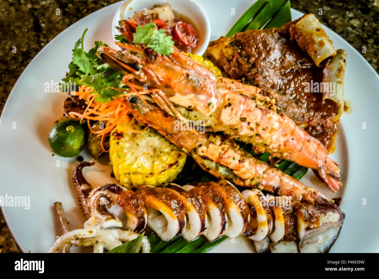 BBQ Seafood combo Stock Photo - Alamy