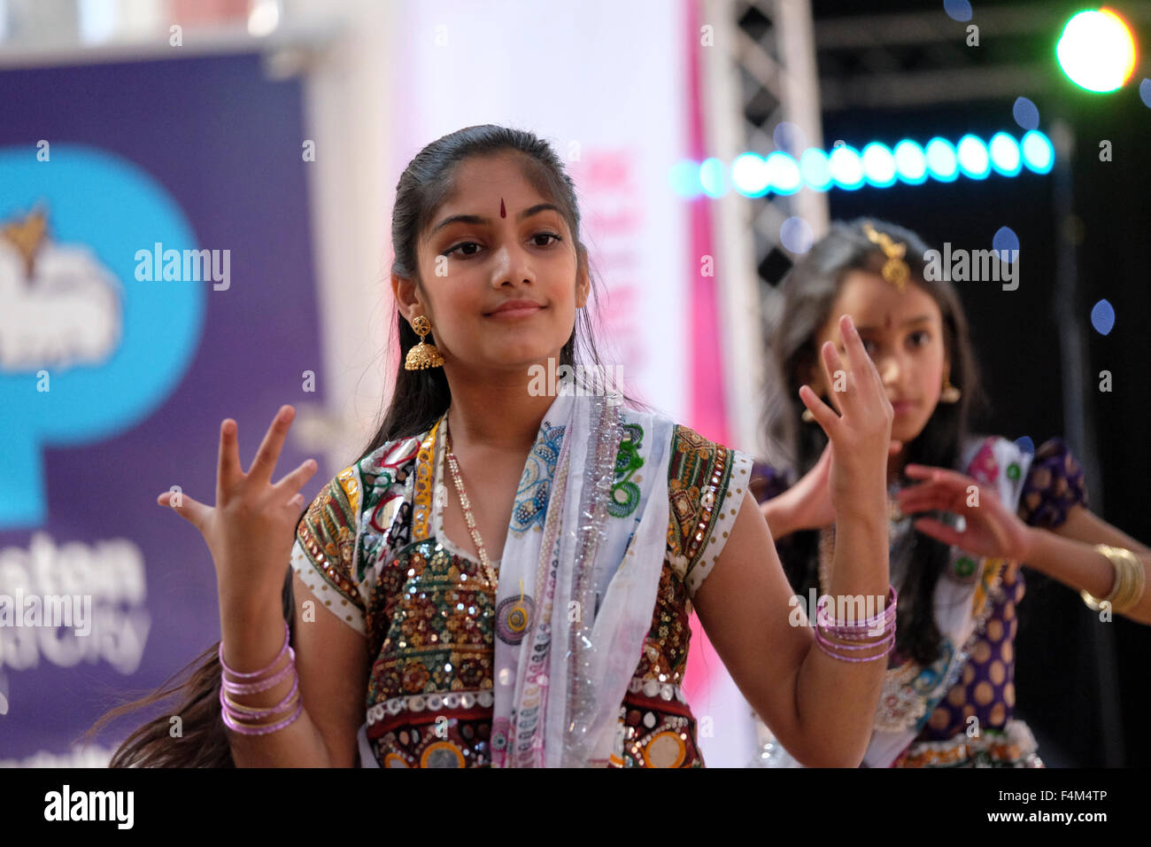 Two young Indian girls taking part in traditional Indian dance ...