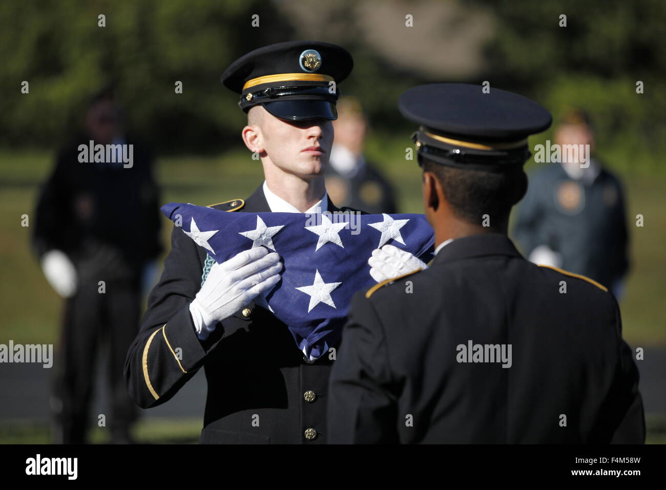 Folding the flag Stock Photo - Alamy