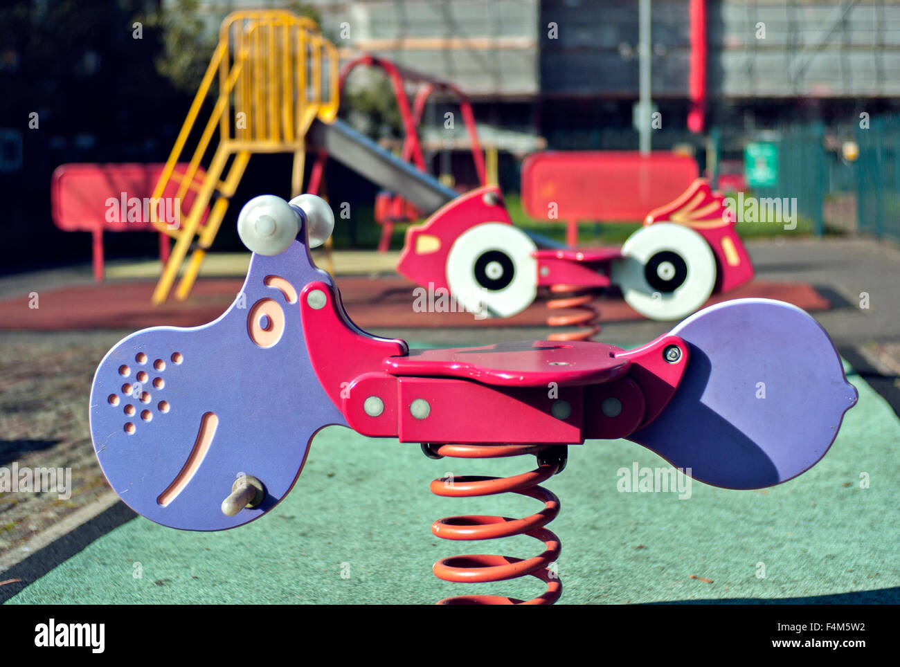 children's public playground spring colorful Hippo character ride Stock ...