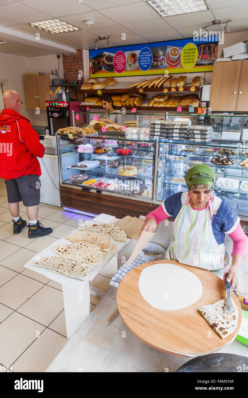 England, London, Greenwich, Turkish Bakery and Cake Shop, Lady Making ...