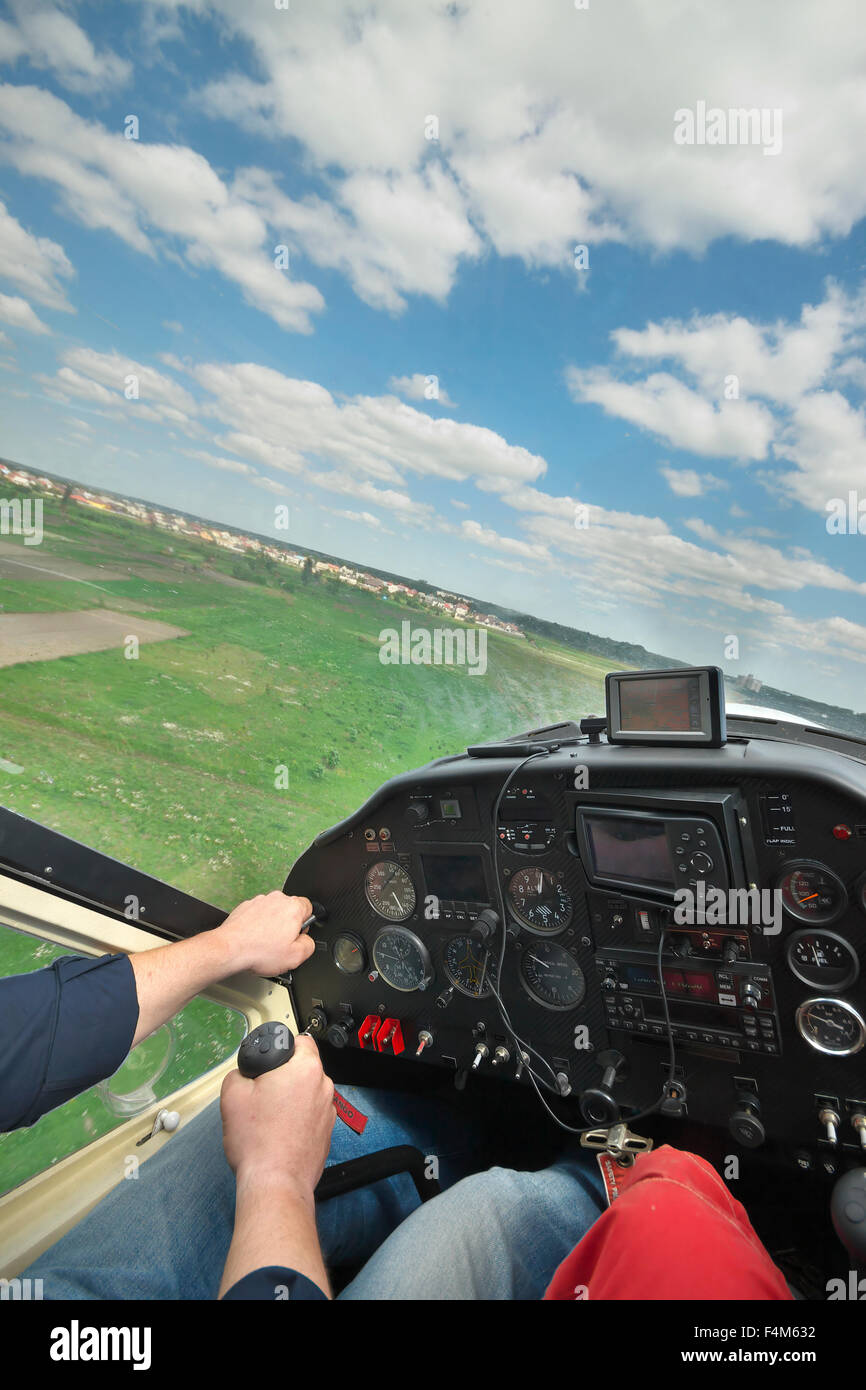 Two men flying a small private aircraft - view from the cockpit Stock ...