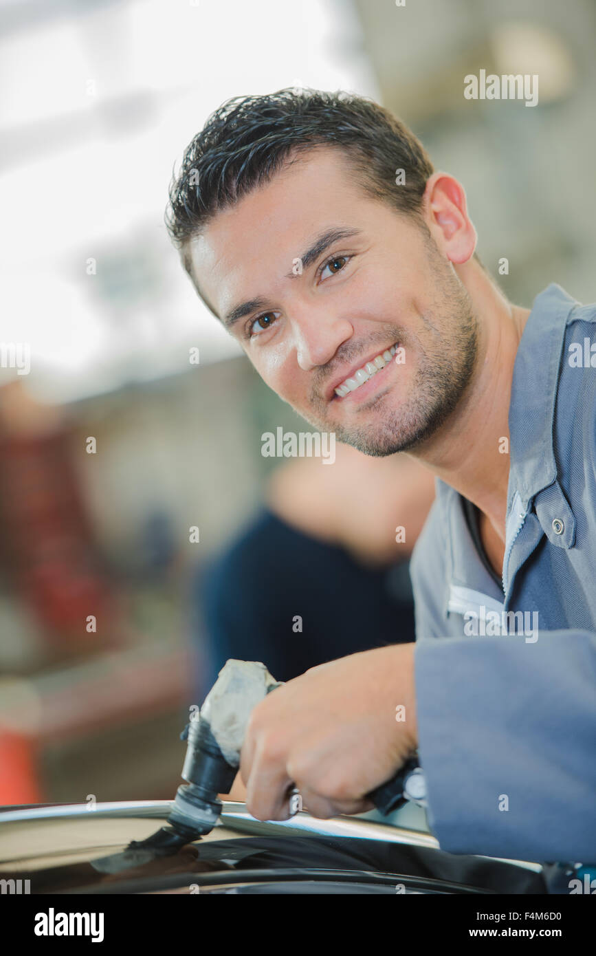 Man working on car Stock Photo - Alamy