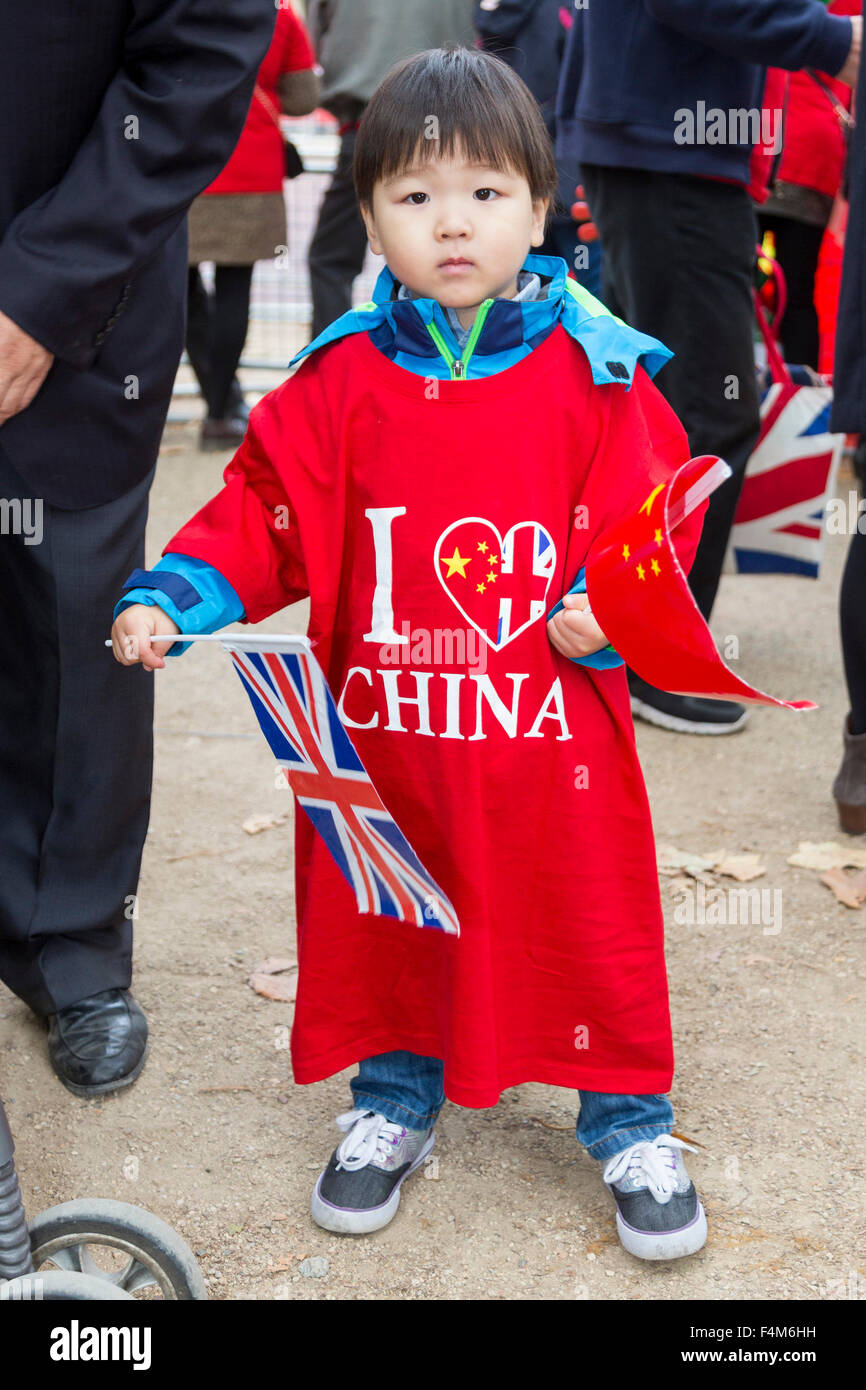 London, UK. 20th October, 2015. A little Chinese boy awaits the arrival ...