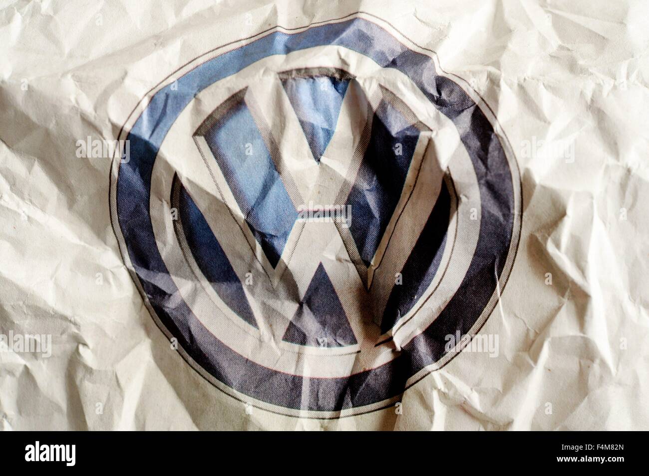 The crinkled logo of VW, Germany, city of Osterode, 20. October 2015 ...