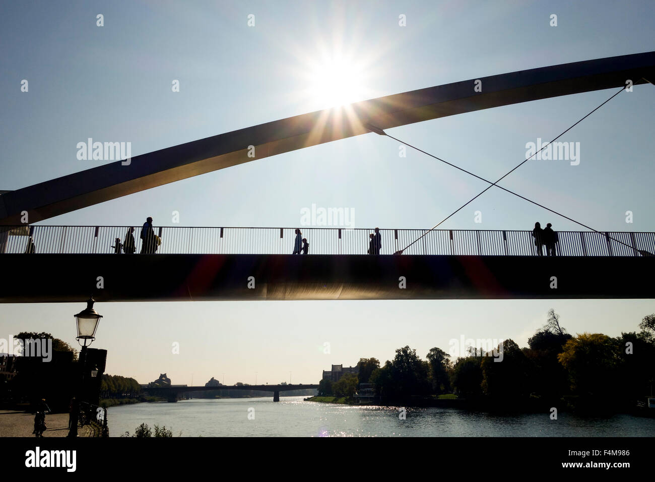 The Hoge brug, pedestrian and cycle bridge that spans the river Meuse ...