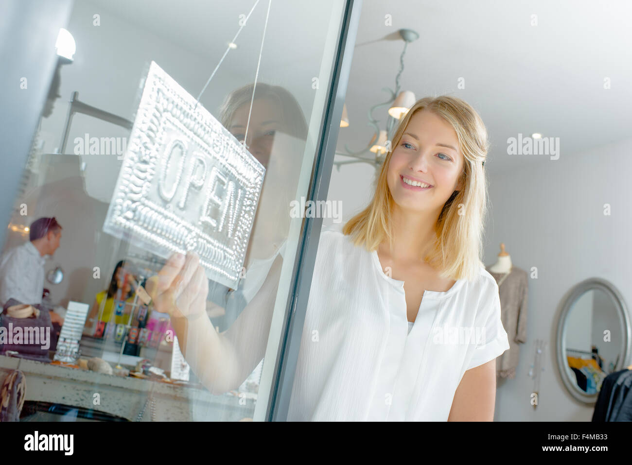 Shop Worker Boutique Female High Resolution Stock Photography and ...