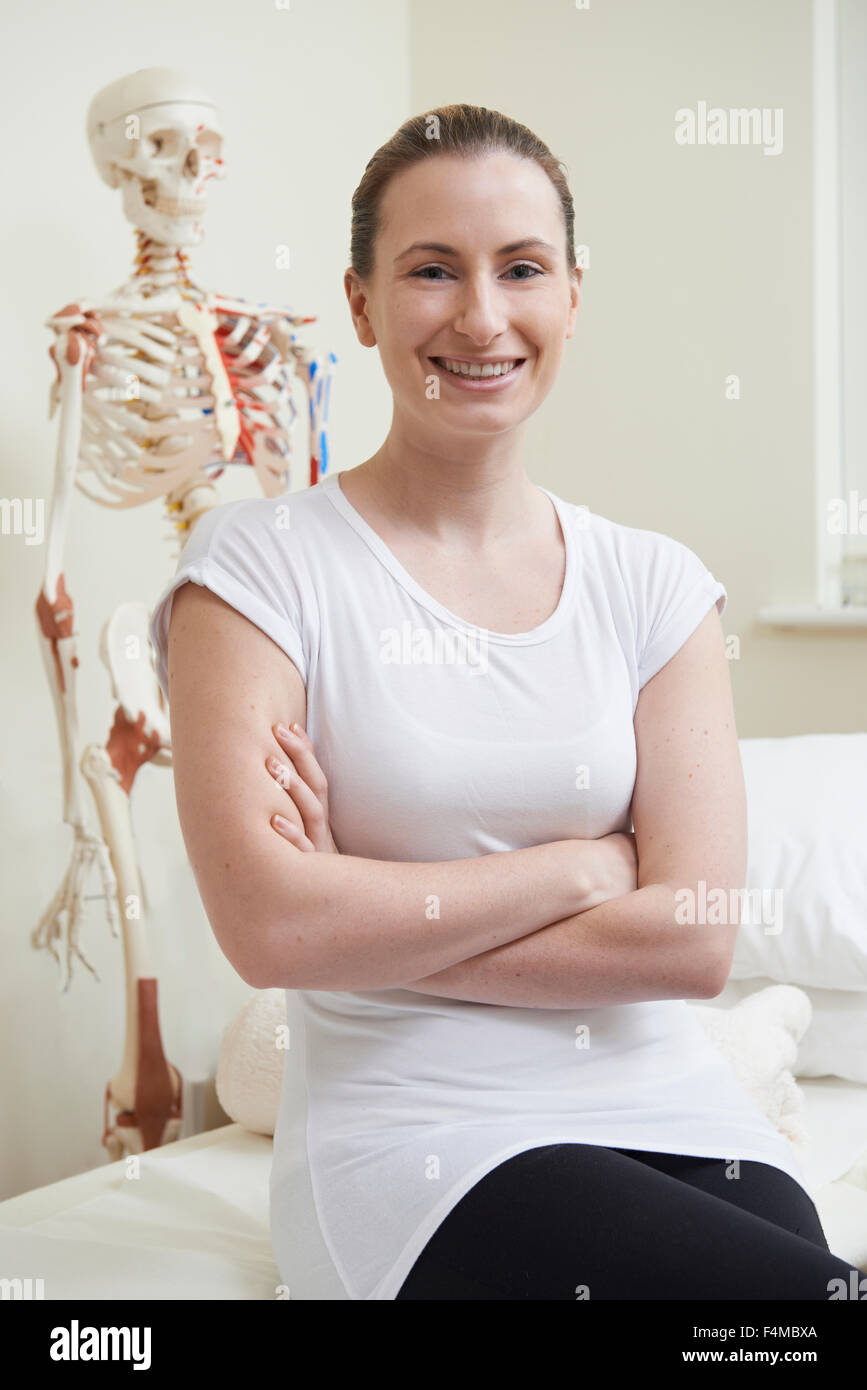 Portrait Of Female Osteopath In Consulting Room Stock Photo - Alamy