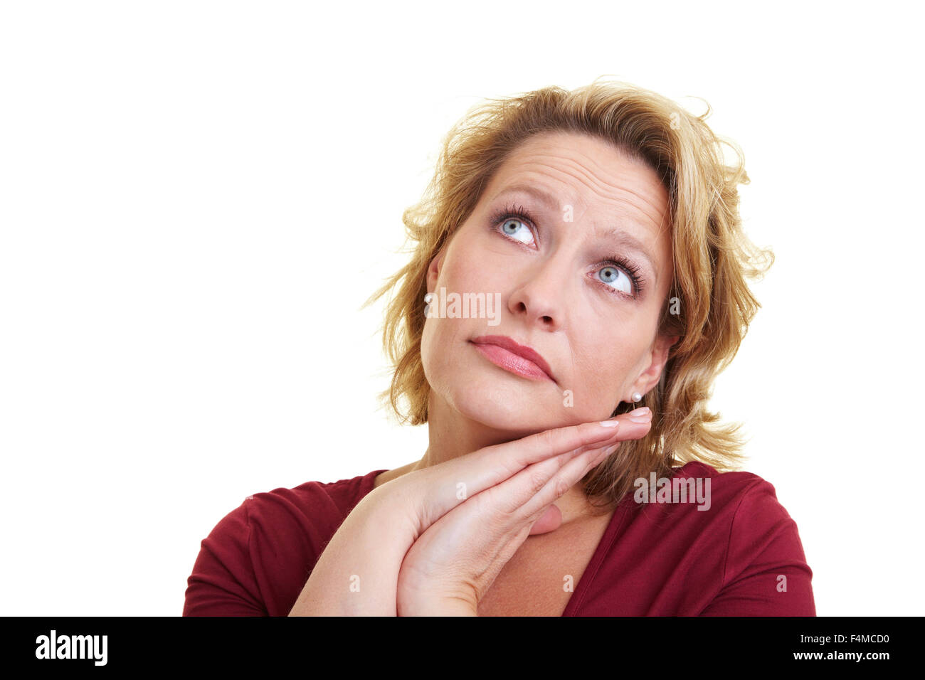 Portrait of a worried woman thinking on isolated background Stock Photo ...