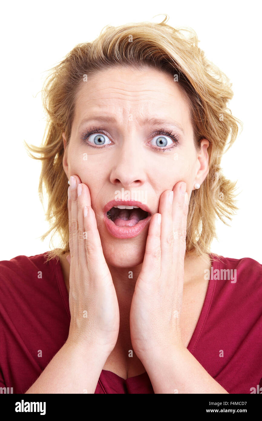 A woman looking shooked into the camera Stock Photo - Alamy
