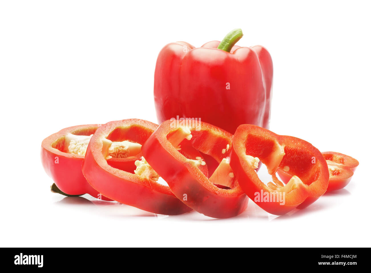 sweet red chopped bell pepper rings, close up, isolated on a white ...