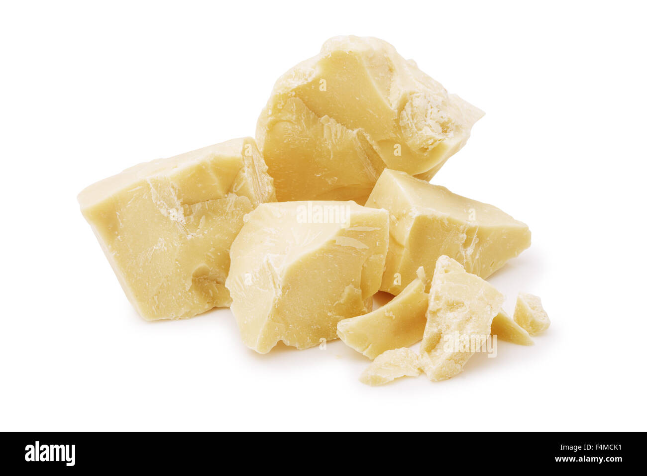 pieces of cocoa butter, close up isolated on white background ...