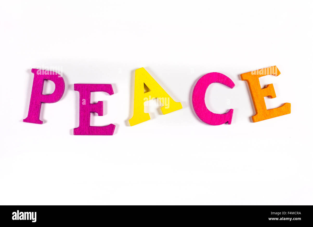 PEACE spelt out with bright coloured letters over a white background ...