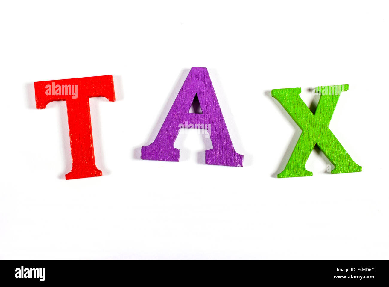 TAX spelt out with bright coloured letters over a white background ...
