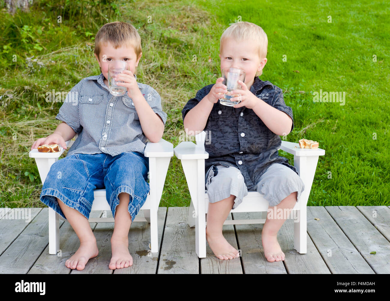 Young brothers having lemonade Stock Photo - Alamy