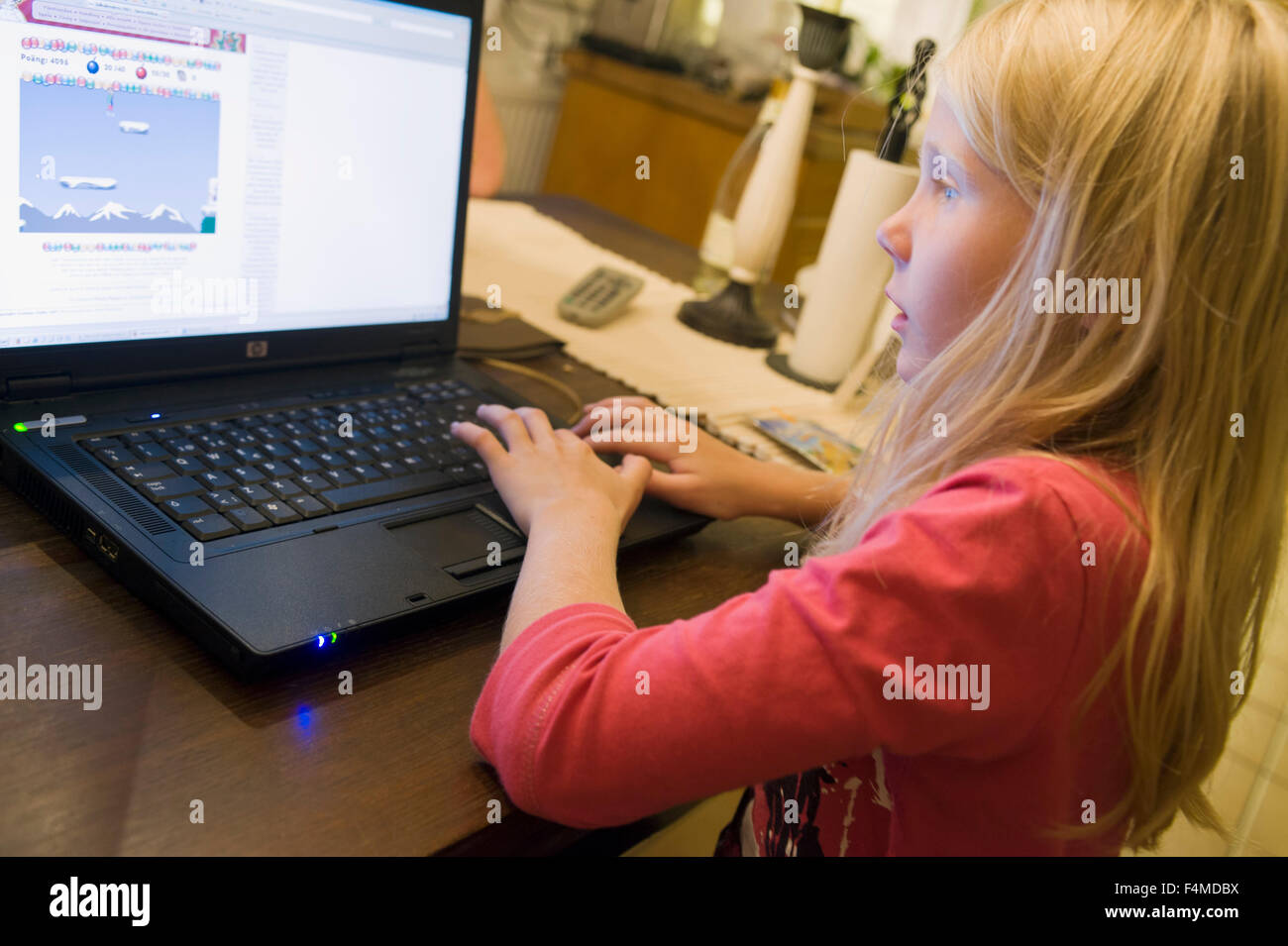 Young girl with laptop Stock Photo - Alamy