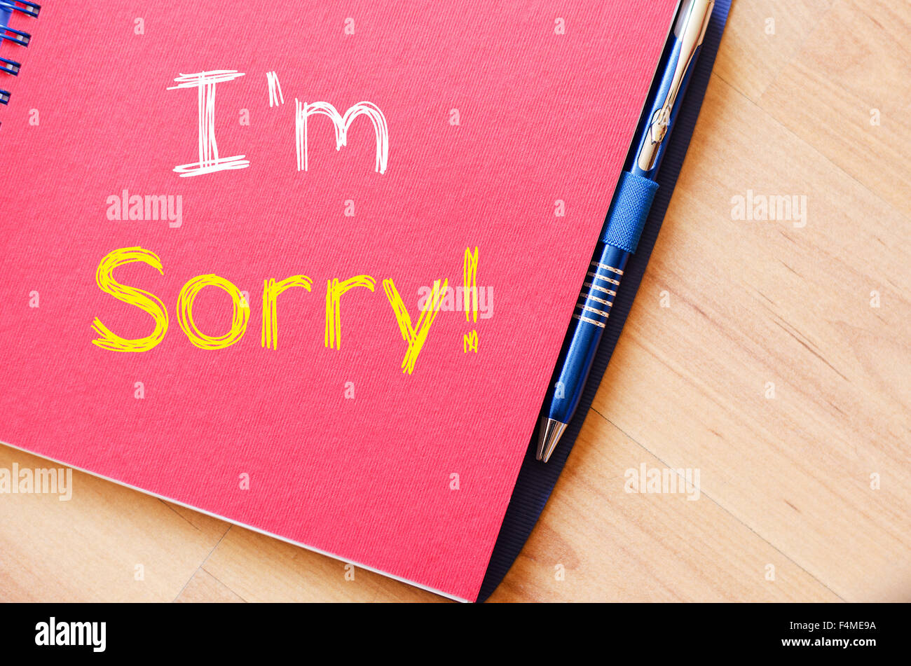 I'm sorry text concept write on notebook Stock Photo - Alamy