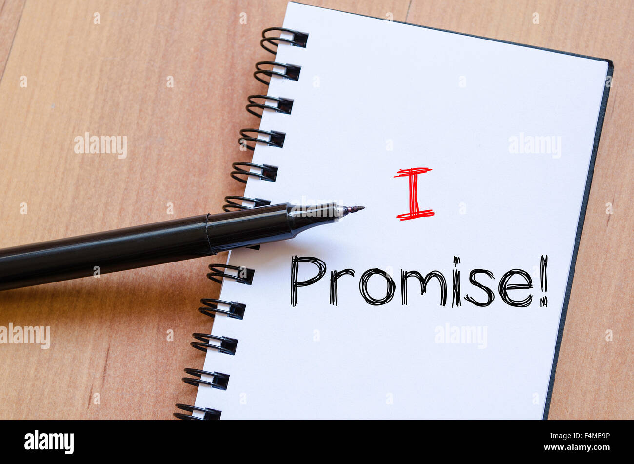 I promise text concept write on notebook Stock Photo - Alamy
