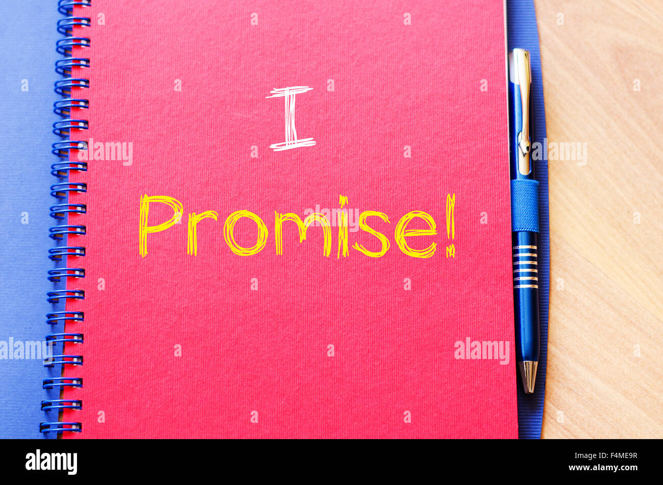 I promise text concept write on notebook Stock Photo - Alamy