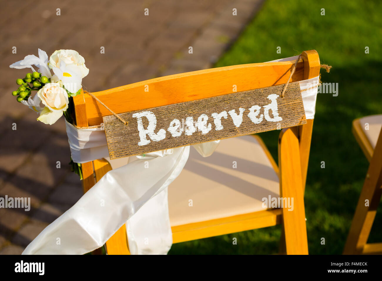 Reserved seating for family at an outdoor wedding ceremony Stock Photo ...
