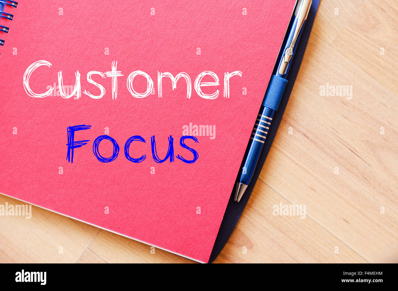 Customer focus text concept write on notebook Stock Photo - Alamy