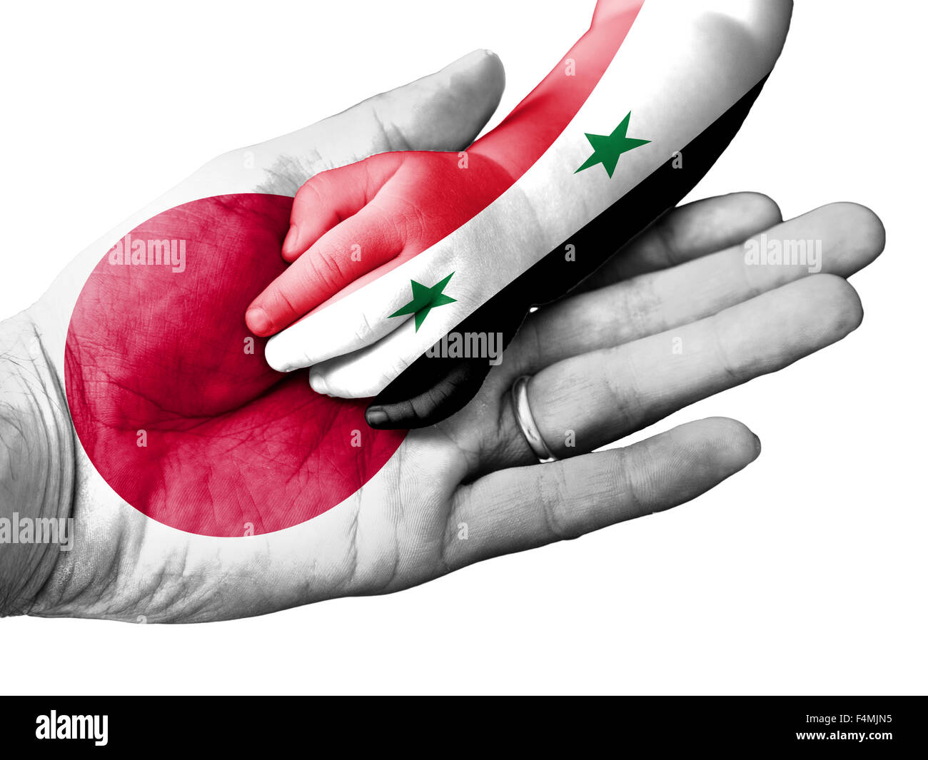 Flag of Japan overlaid the hand of an adult man holding a baby hand ...