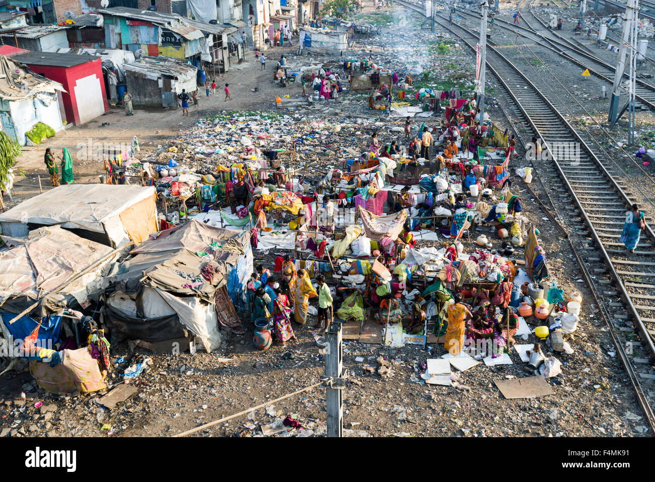 People are living under extrem conditions in huts made from iron sheets ...